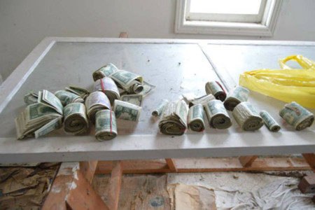 Urban Exploration Photographer Finds a Stash of Cash in an Abandoned ...