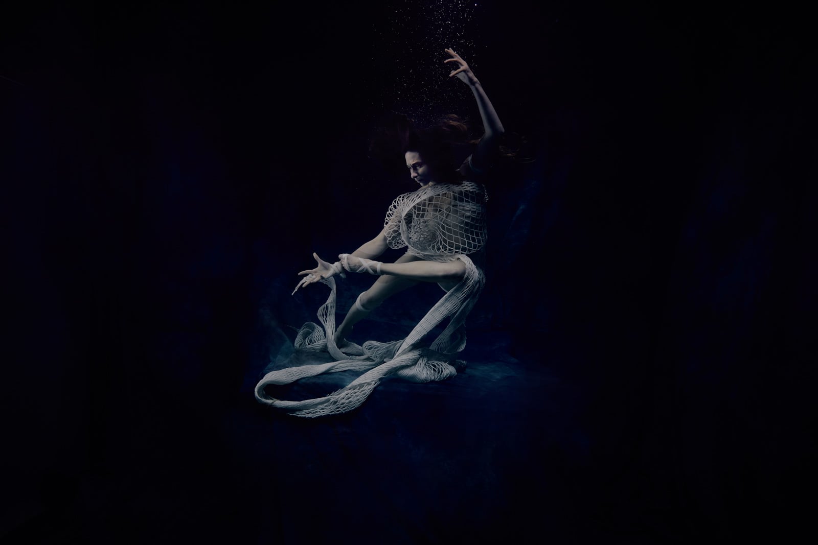 Underwater Photos of Woman in a Net Show the Horrors of Ghost Fishing ...