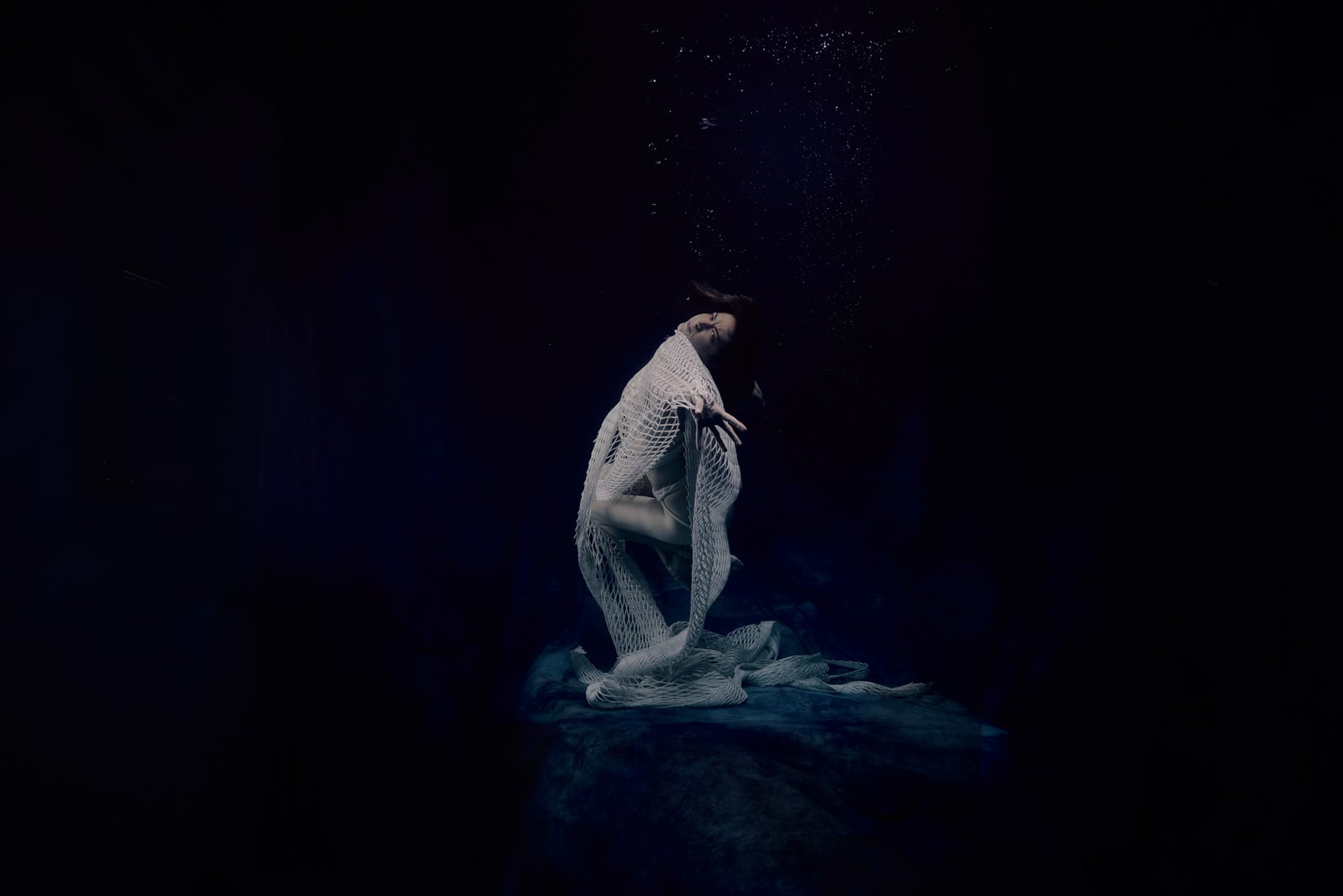 Underwater Photos of Woman in a Net Show the Horrors of Ghost Fishing ...