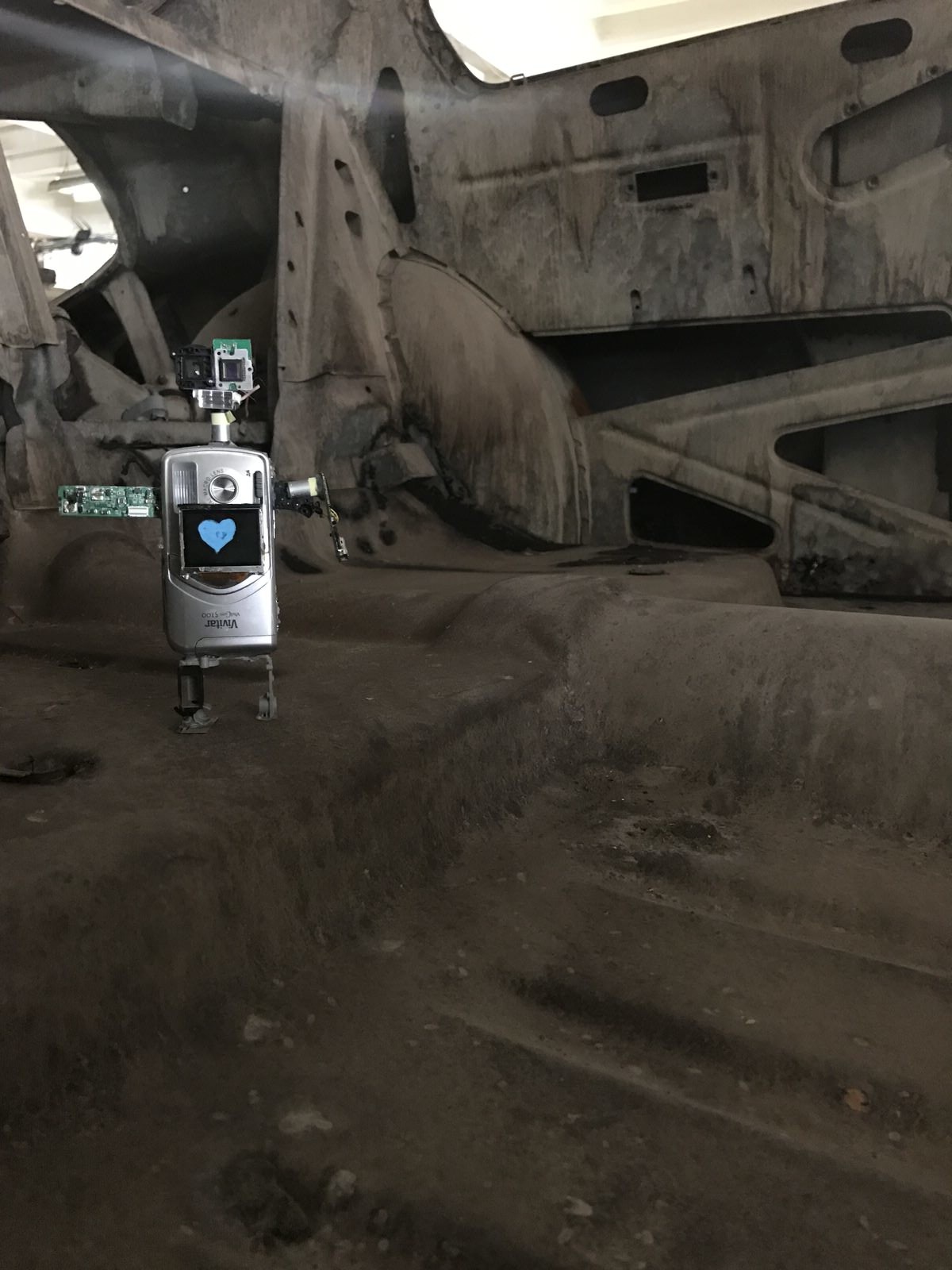 This Artist Turns Trashed Cameras Into Little Robots | PetaPixel