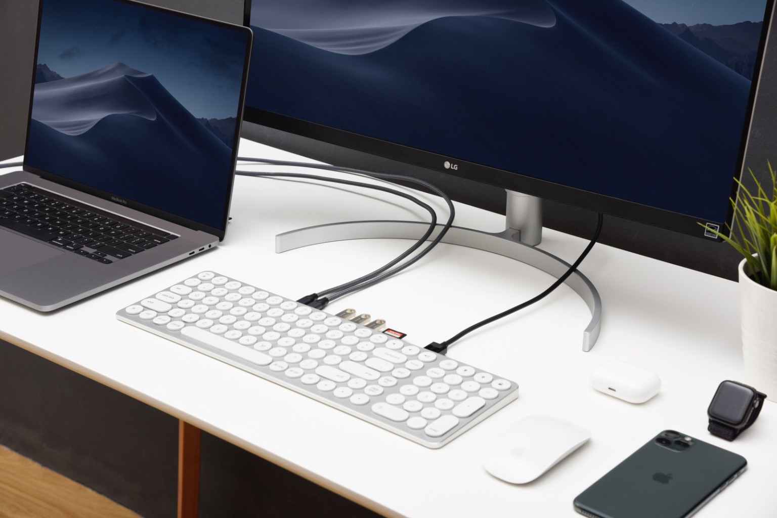 This Sleek Keyboard Doubles as an SD Card Reader, USB Hub, and More ...