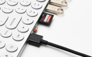 This Sleek Keyboard Doubles as an SD Card Reader, USB Hub, and More ...