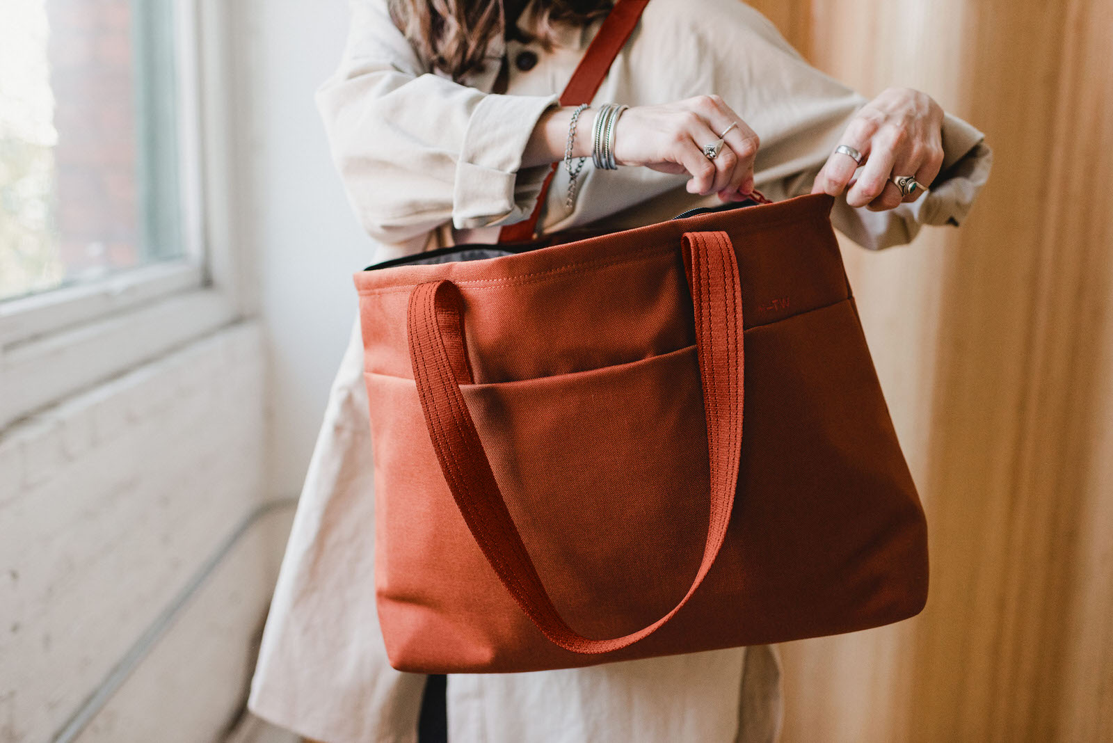 Moment Unveils the Travelwear Line: A Backpack and Tote to Work ...