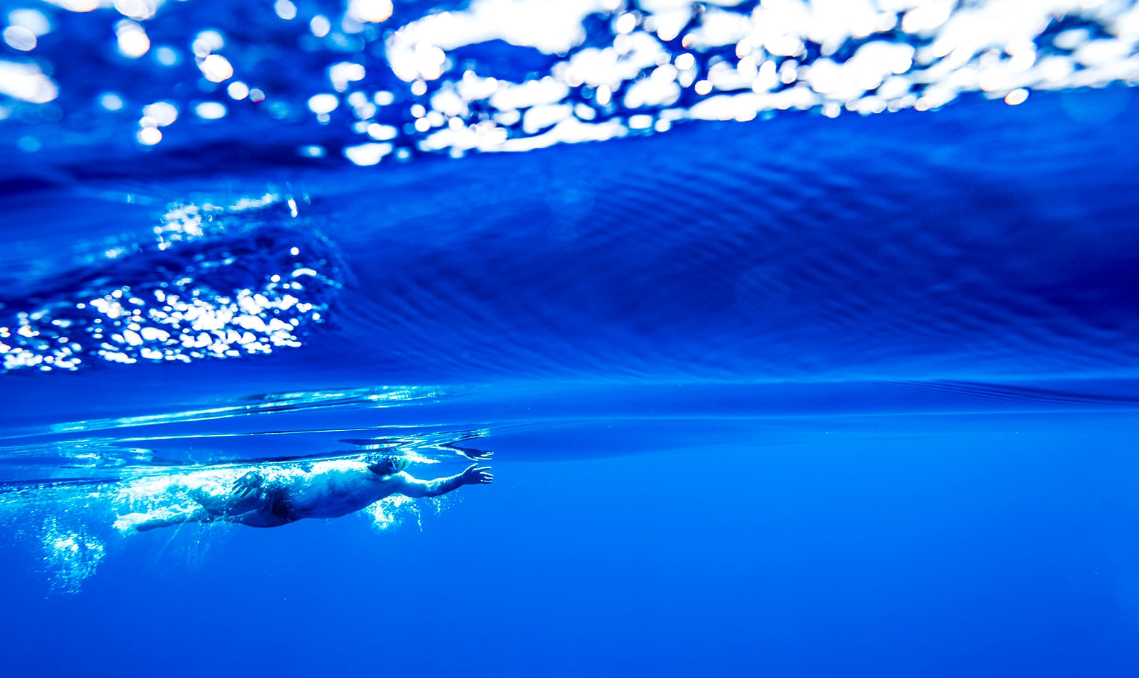These Photos Document an Incredible 28-Hour, 62-Mile Open-Water Swim ...