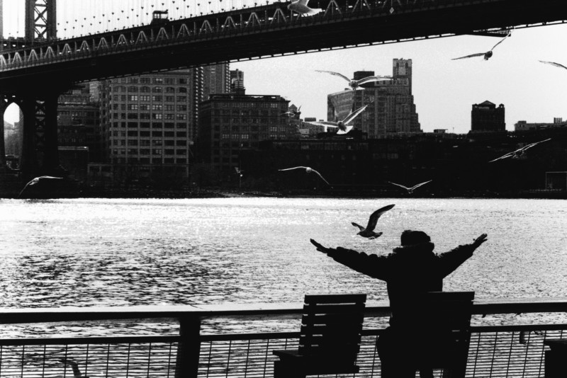 Layer Elements with Longer Lenses in Street Photography - Top Tech News