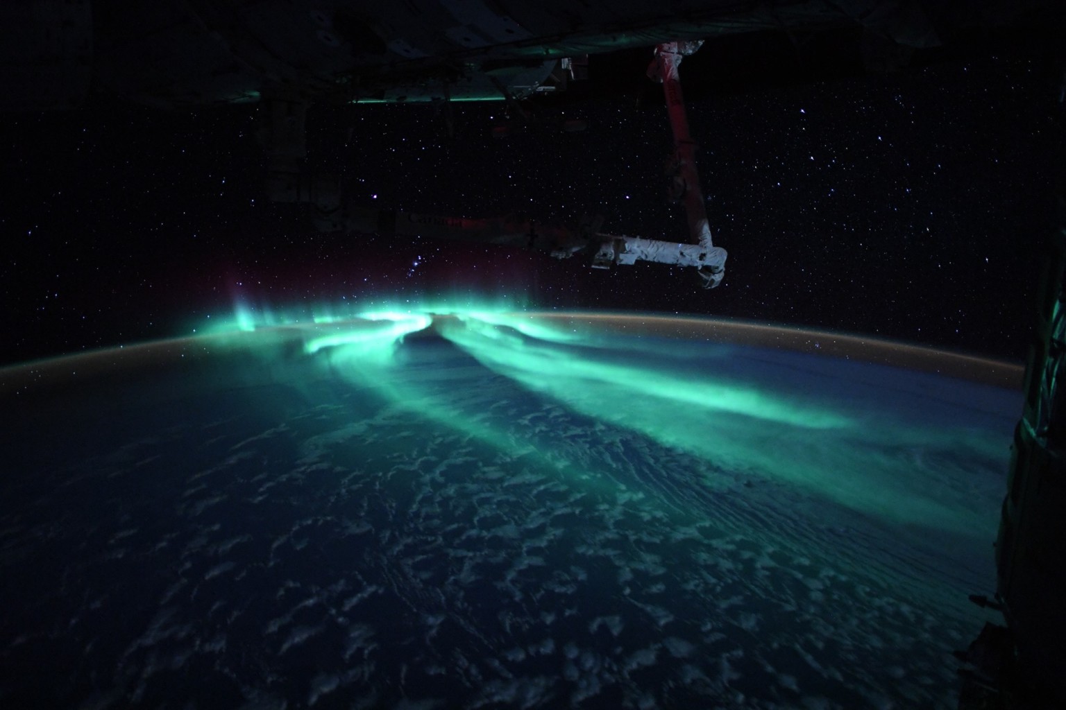 Astronaut Captures Photos of Rare Blue Aurora Illuminated by the Moon ...