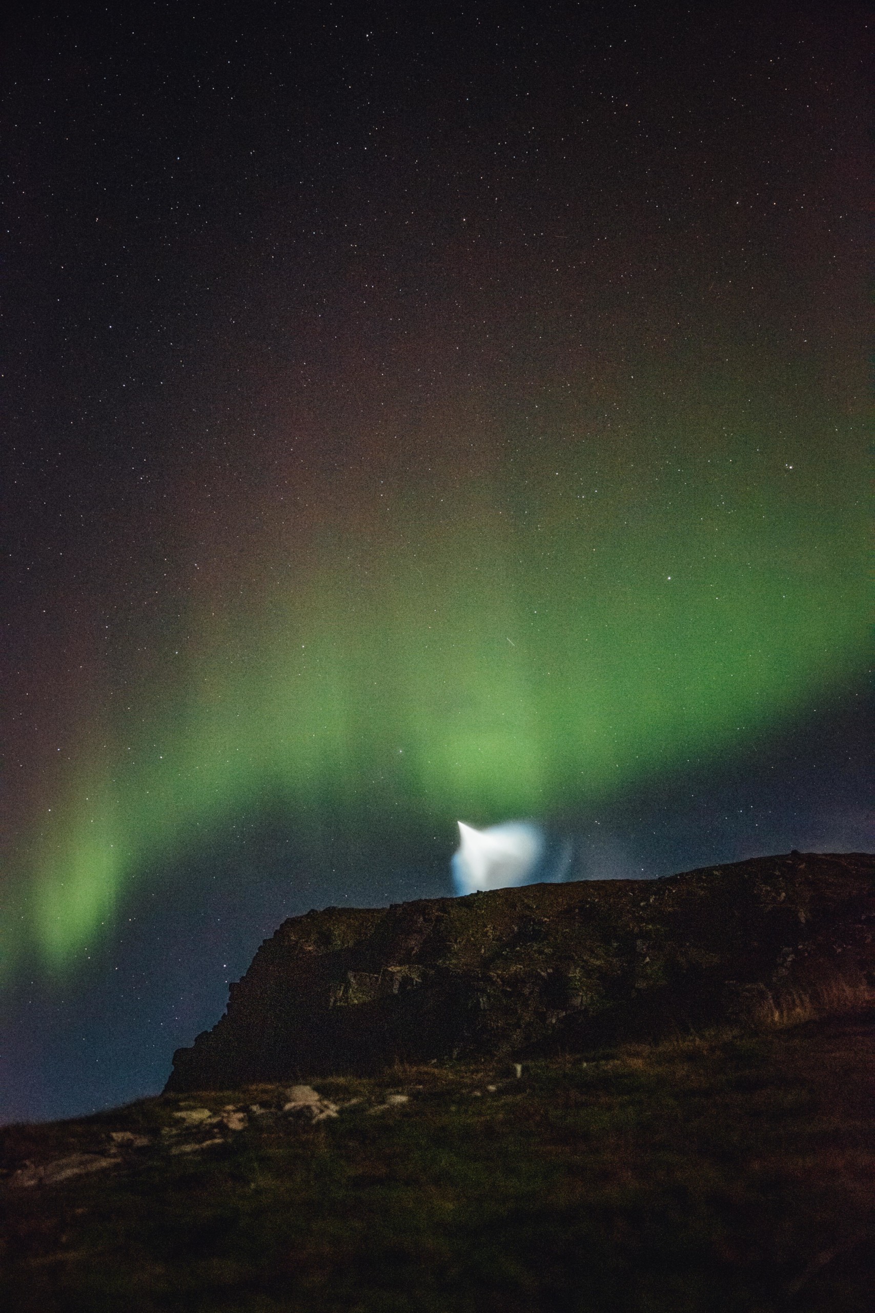 Photographer Captures NASA Rocket Flying Over the Northern Lights ...