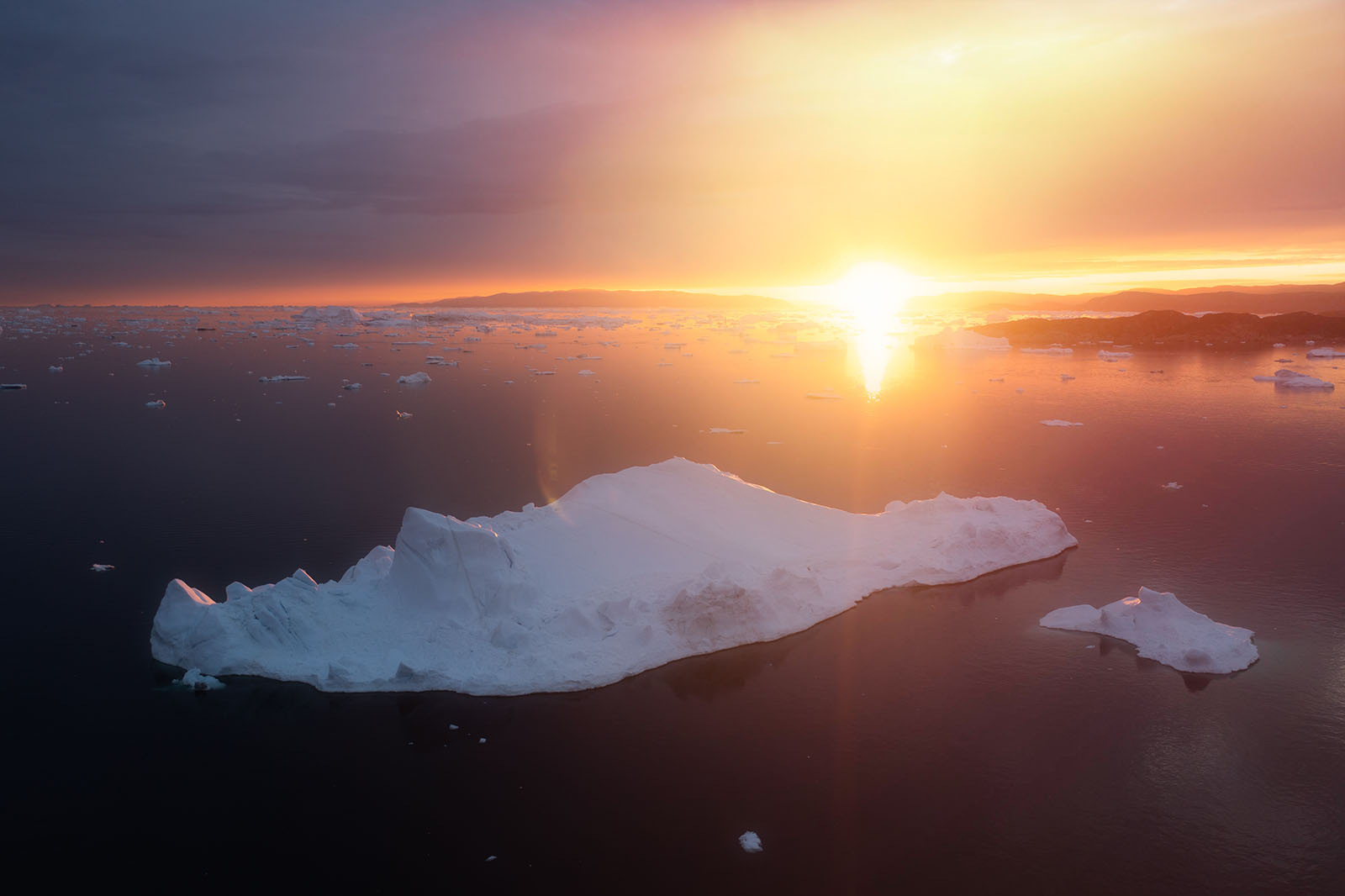 Incredible footage of a sudden iceberg collapse in Greenland | PetaPixel