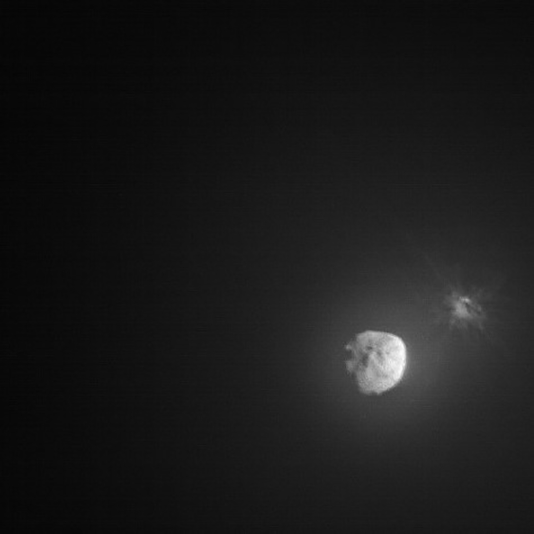 First Photos of the DART Asteroid Impact Shot by a Mini Space Camera ...
