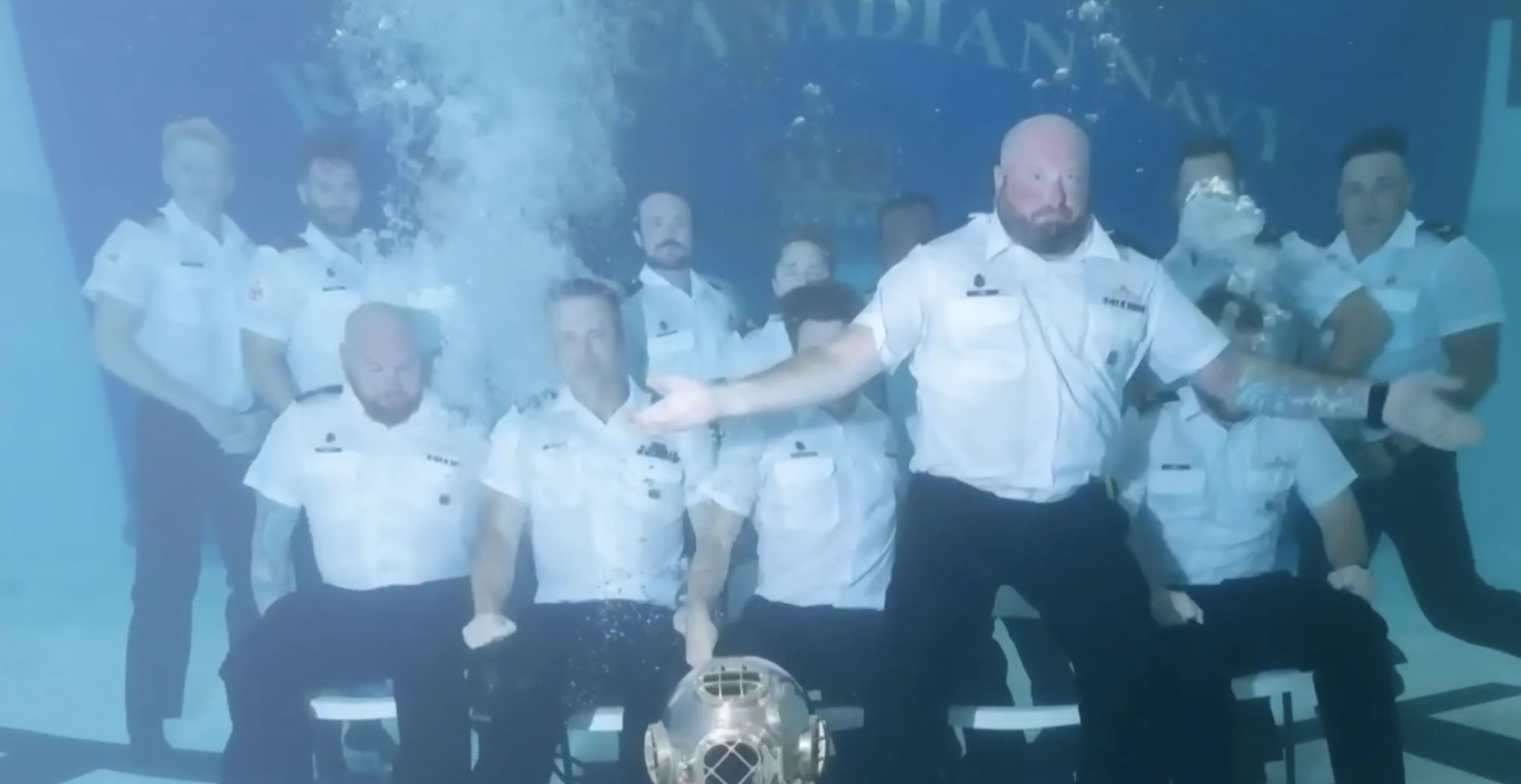 Photographer Tasked with Capturing Underwater Graduation Class Photo ...