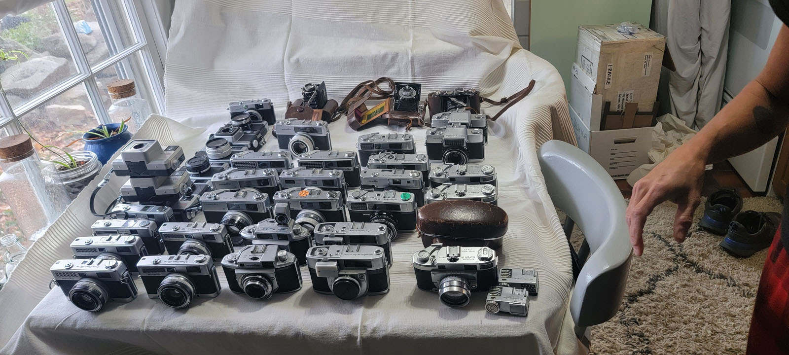 Couple Finds Trove of 2,000 Cameras and Lenses in Storage Unit | PetaPixel