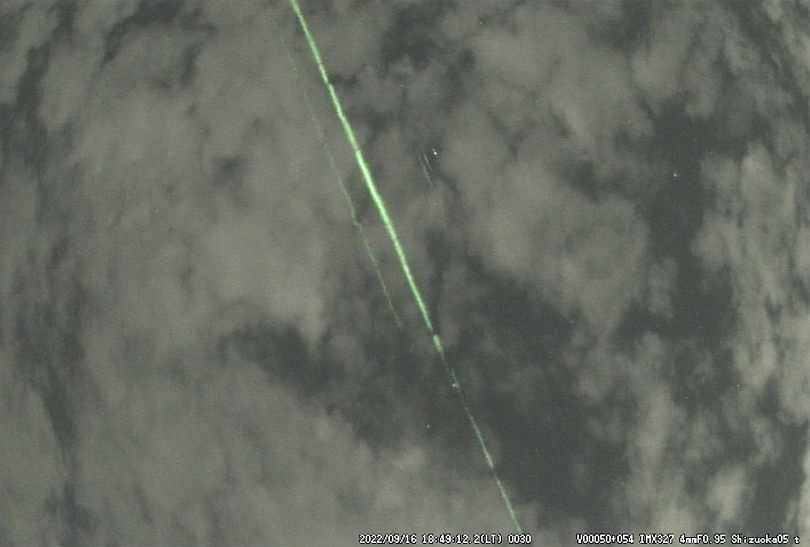 Astronomer Captures NASA's Mysterious Green Laser Beams | PetaPixel