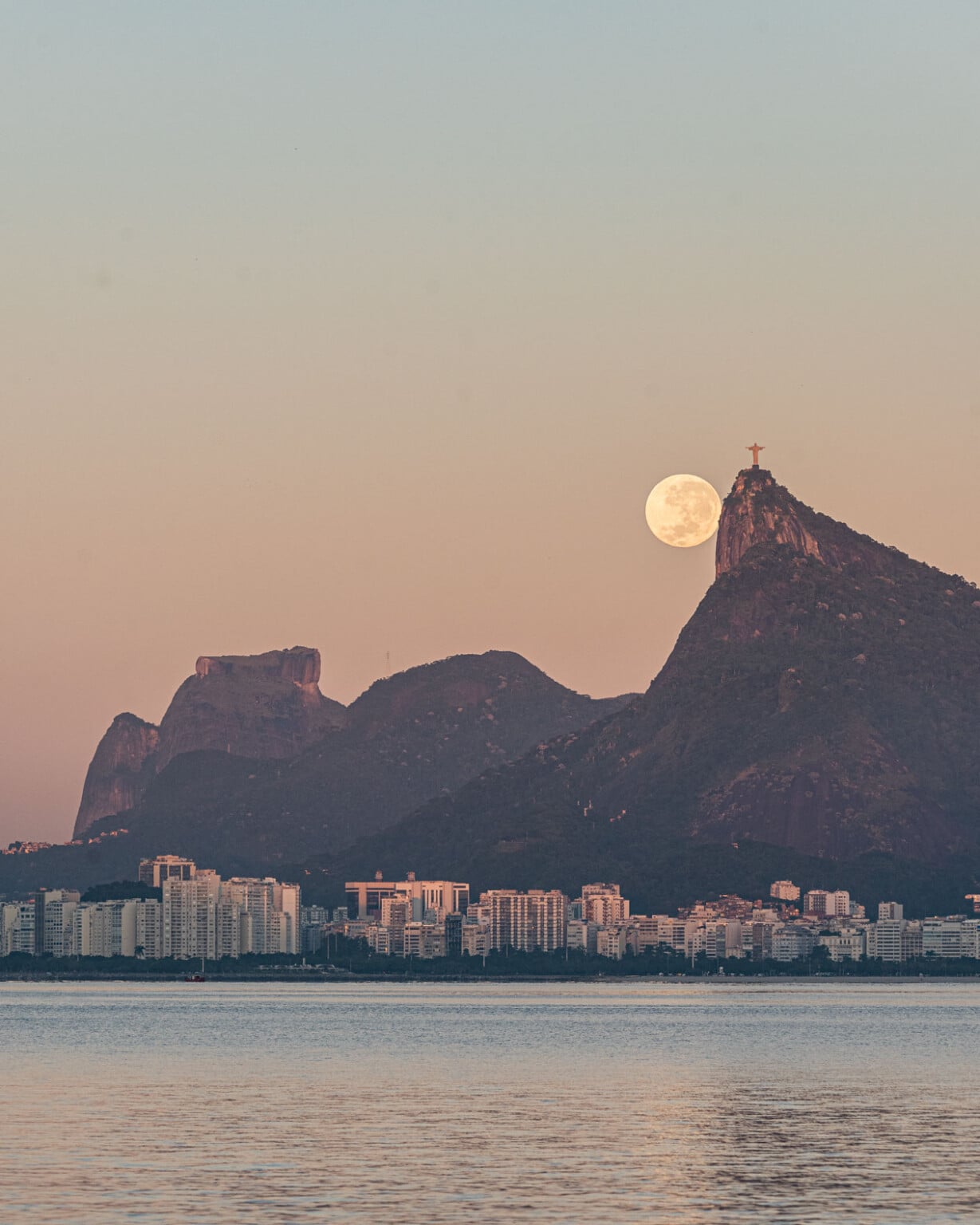 Photographer Captures Christ The Redeemer Holding The Moon | PetaPixel