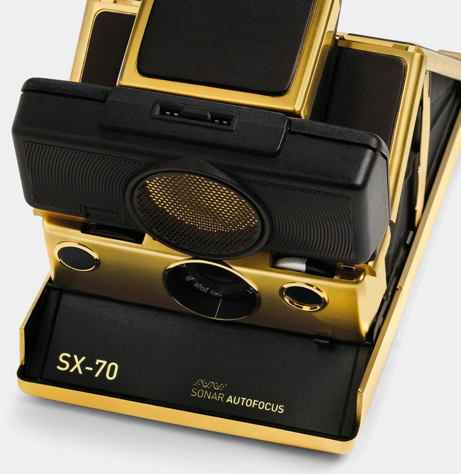 Retrospekt Plates Iconic Polaroid Instant Camera in 24K Gold | PetaPixel