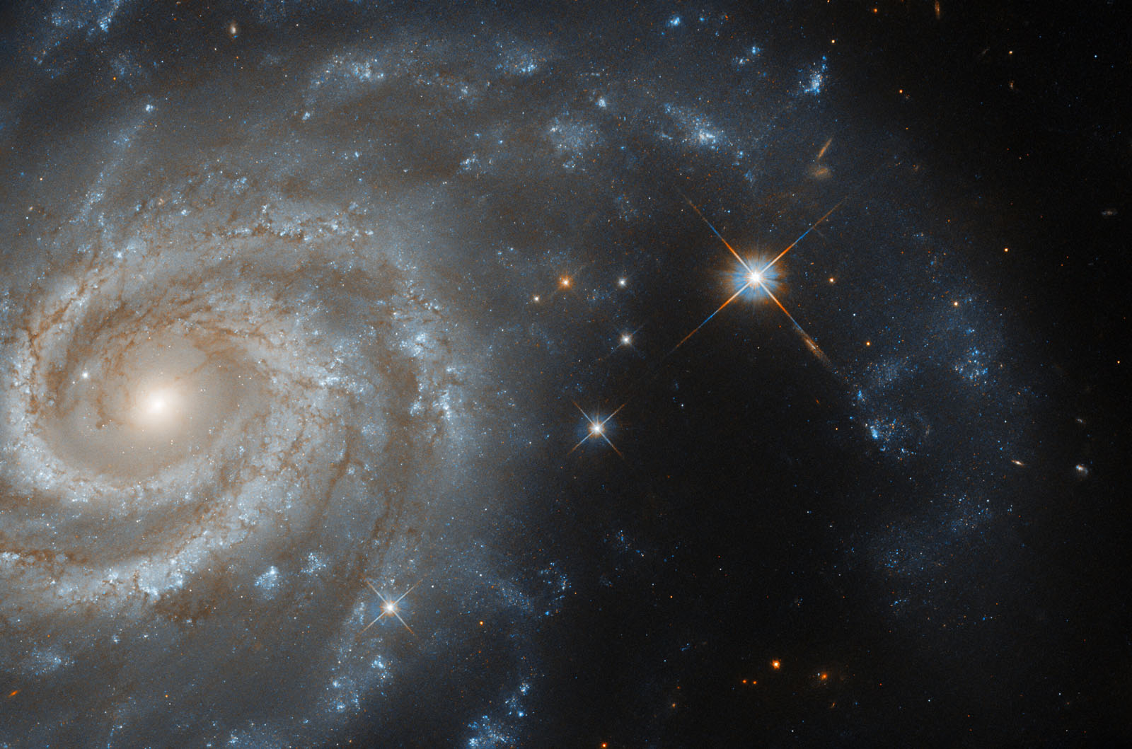 Hubble Shows a Peaceful, Aged Galaxy and a Spiraled Supernova Remnant ...