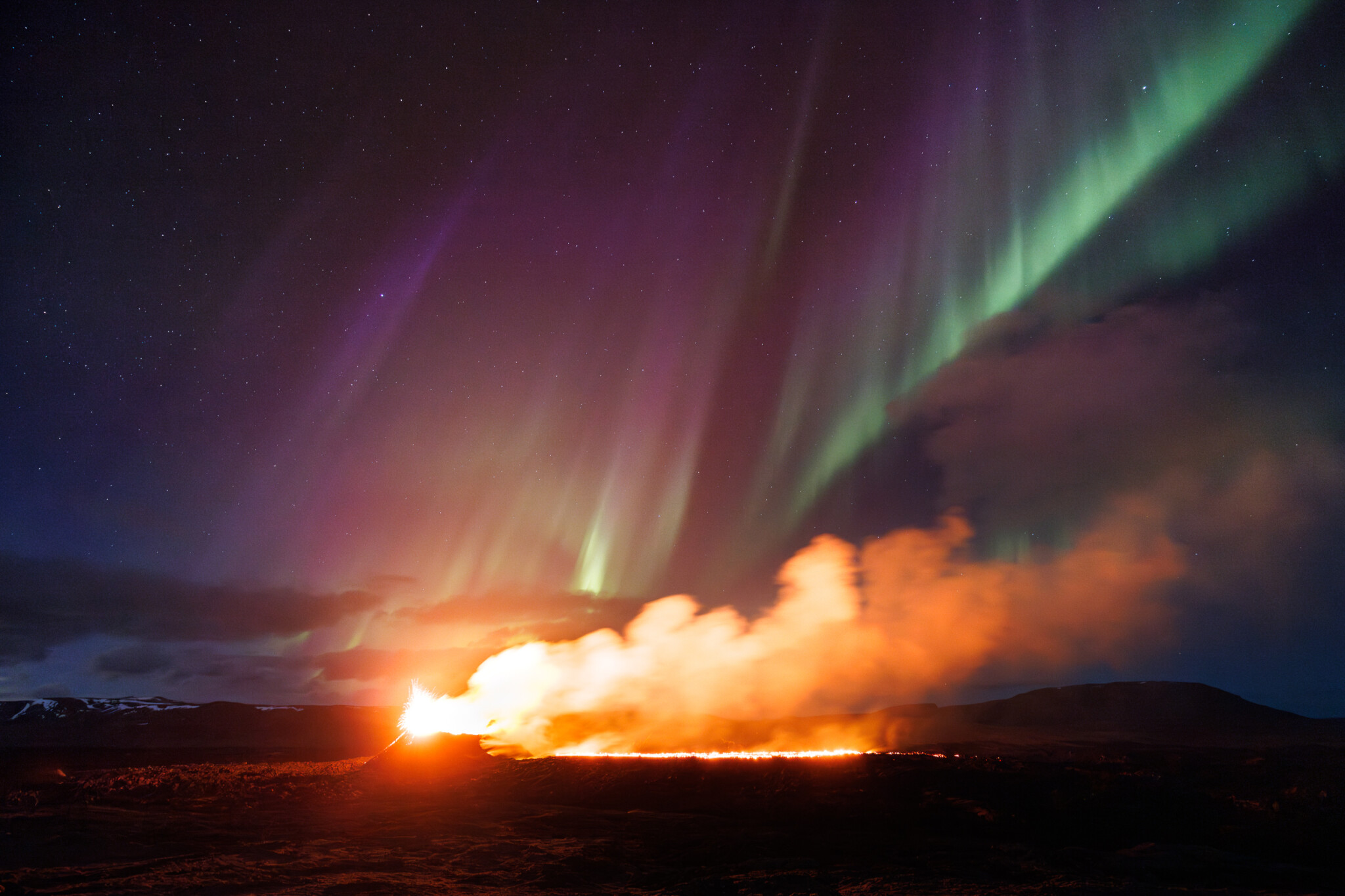 Photographer Captures Northern Lights Over an Erupting Volcano | PetaPixel