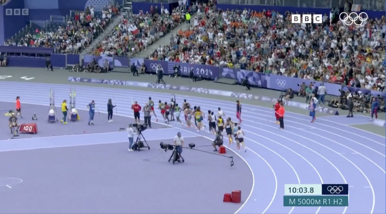 Olympic Cameraman Wanders Onto Track and Disrupts 5,000-Meter Race ...