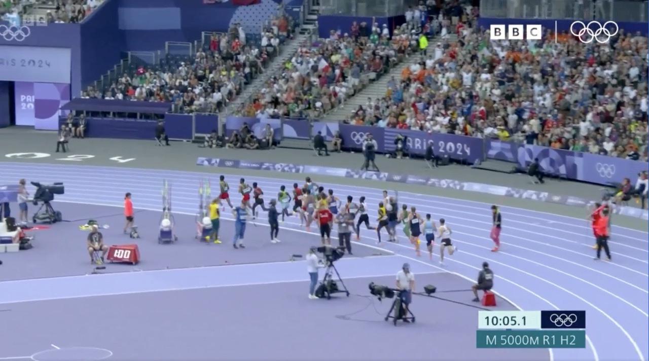 Olympic Cameraman Wanders Onto Track and Disrupts 5,000-Meter Race ...