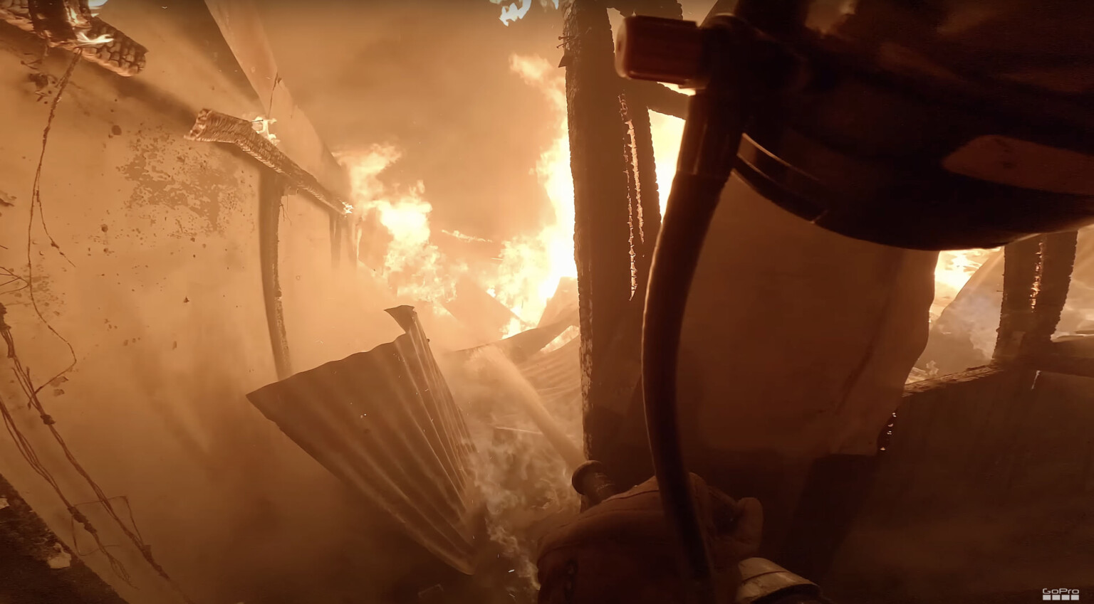 Intense POV Footage Shows Brave Firefighter Extinguish a Burning ...