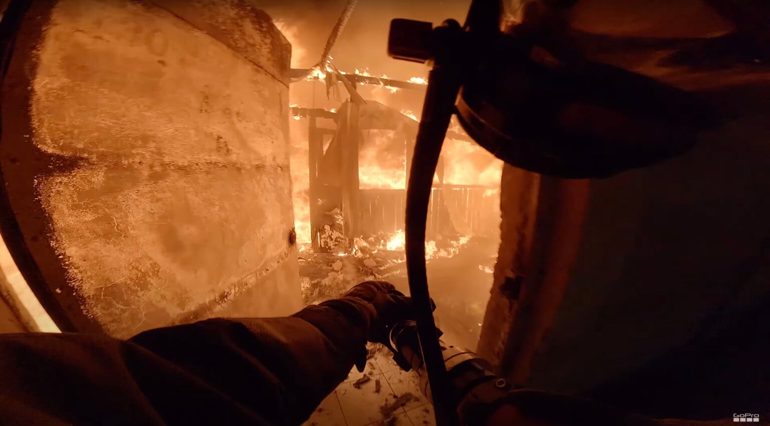 Intense POV Footage Shows Brave Firefighter Extinguish a Burning ...