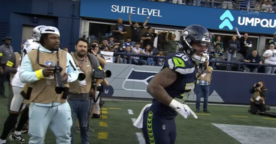 Ex-NFL Star Marshawn Lynch Throws Elbow to Protect Camera as NFL ...